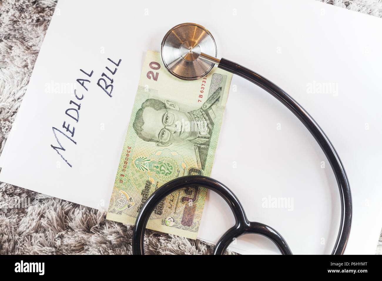 Stethoscope with wording of "Medical Bill" showing expensive healthcare ...