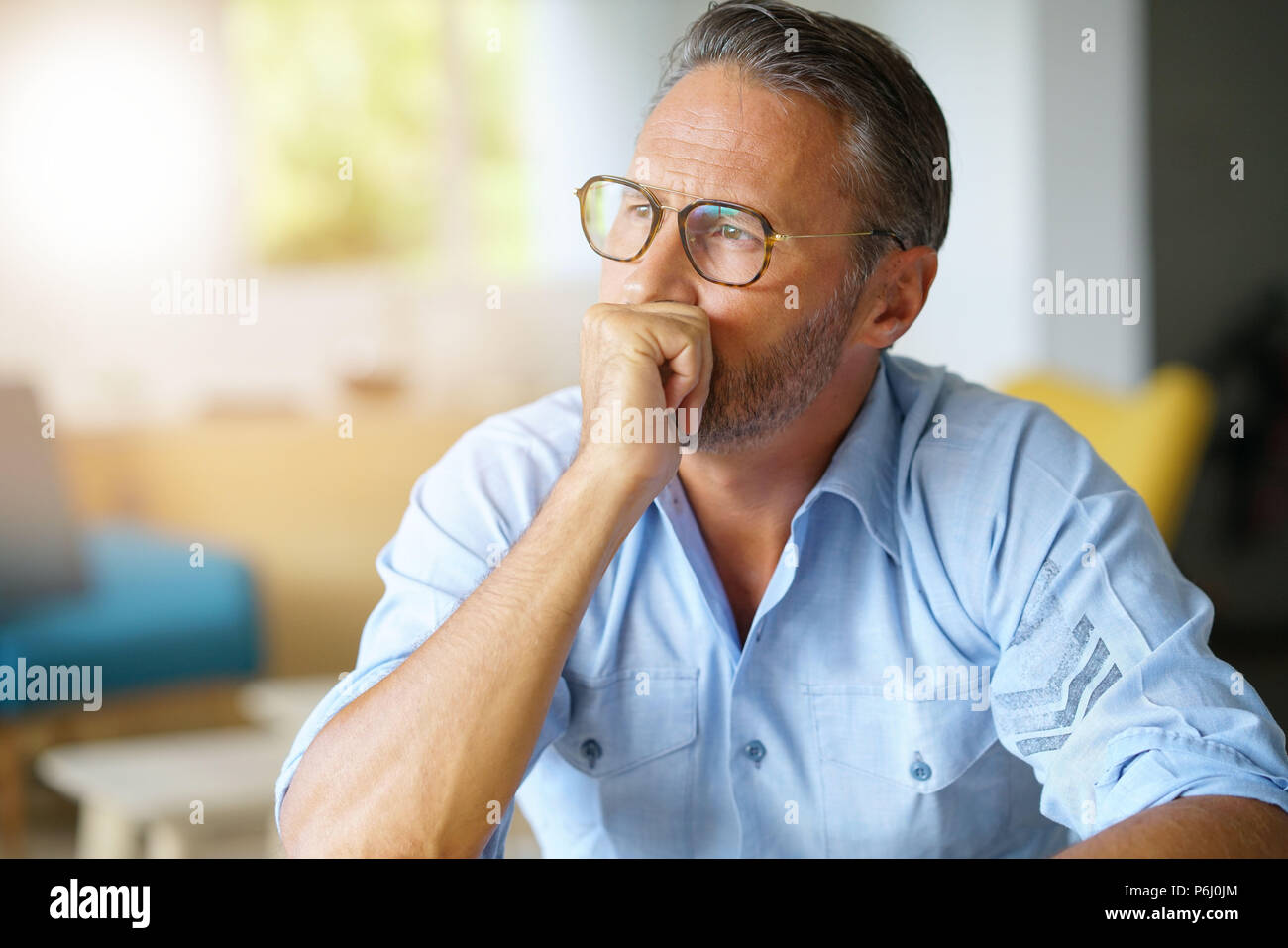 Portrait of handsome 45-year-old man with eyeglasses Stock Photo - Alamy