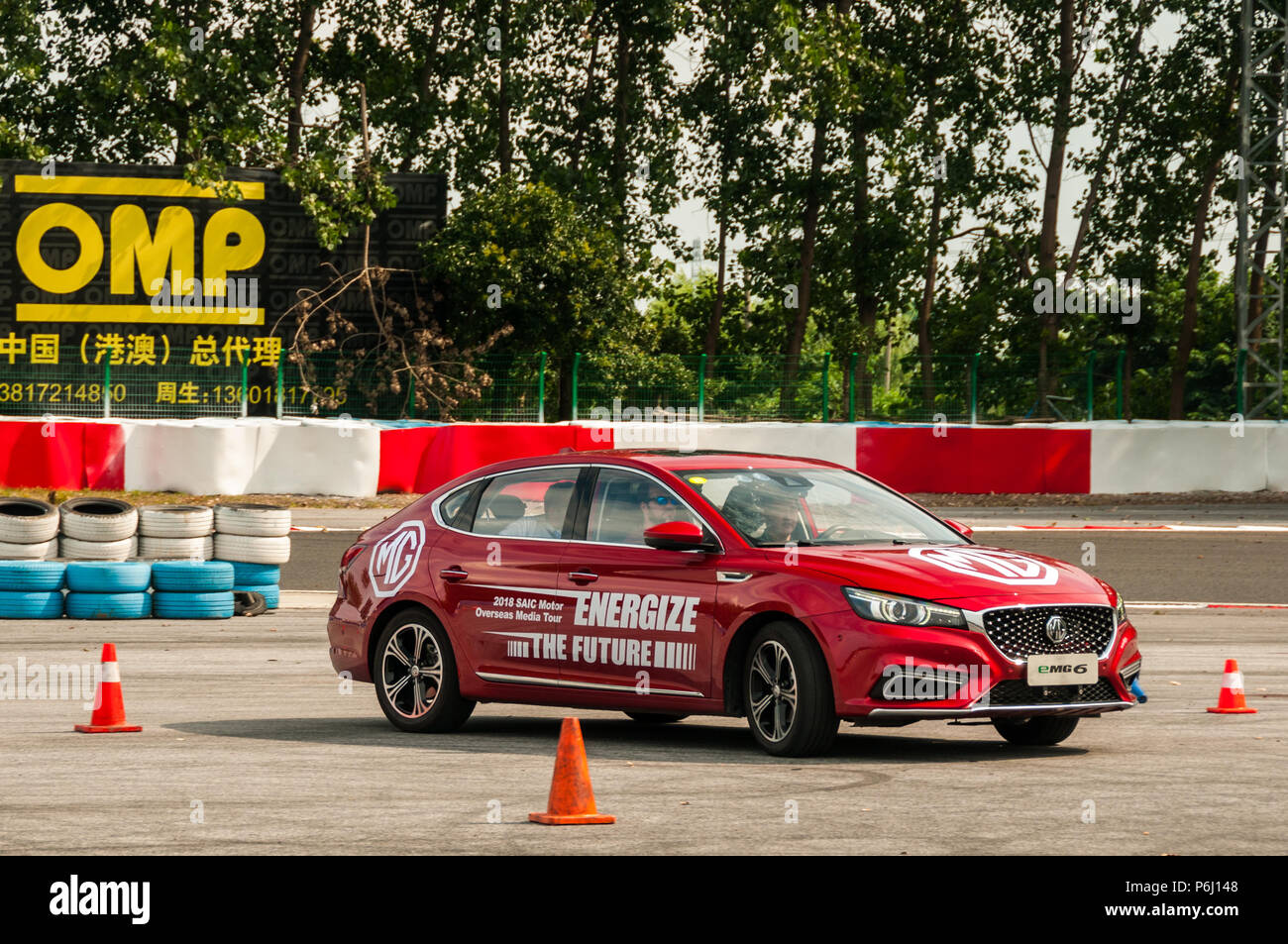An eMG 6 from Chinese car manufacturer SAIC manoeuvring on a slalom ...