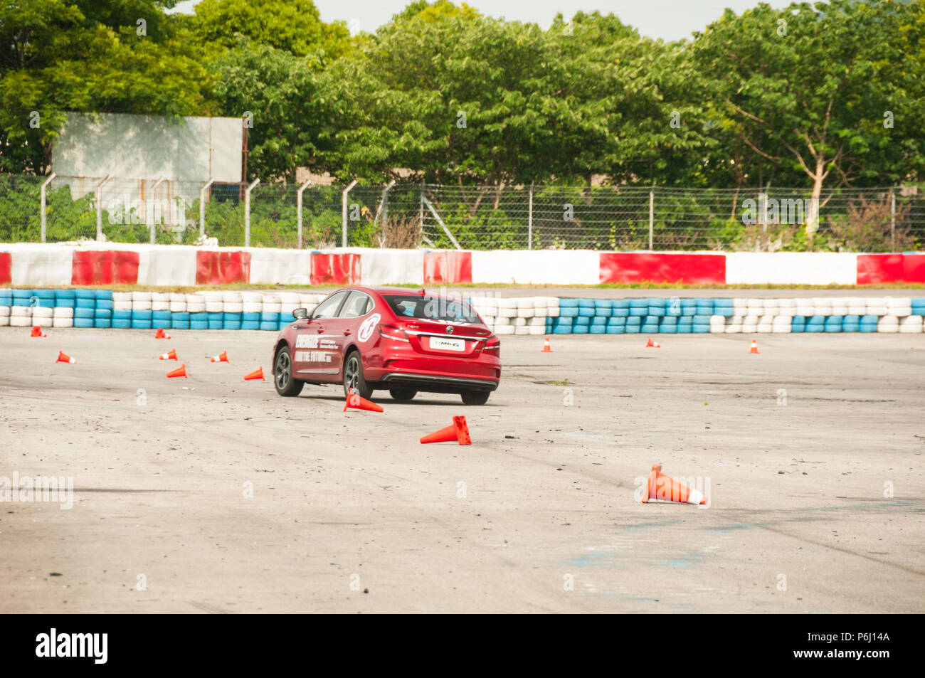 An eMG 6 from Chinese car manufacturer SAIC manoeuvring on a slalom ...