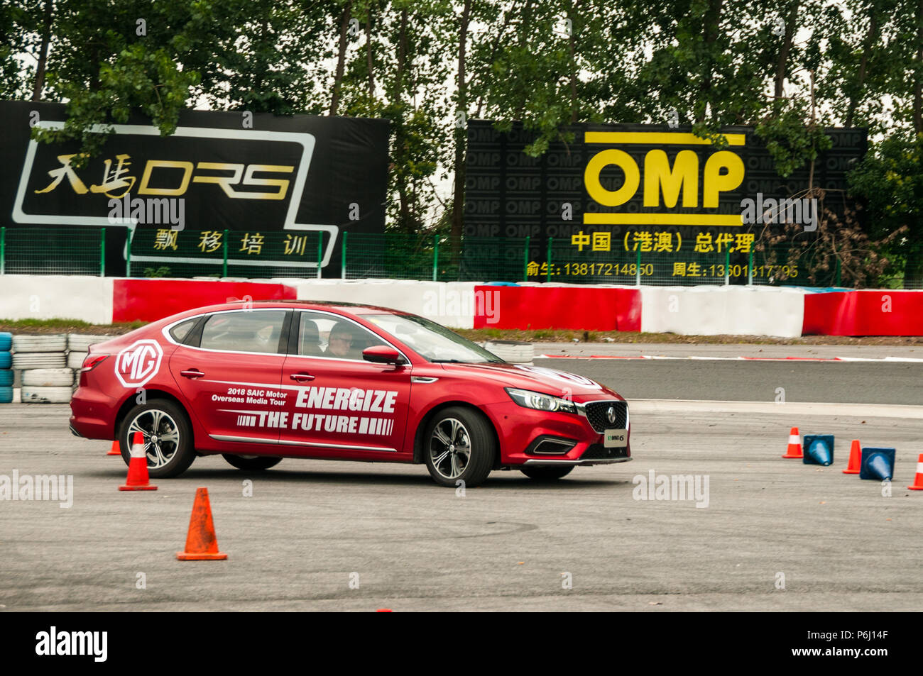 An eMG 6 from Chinese car manufacturer SAIC manoeuvring on a slalom ...
