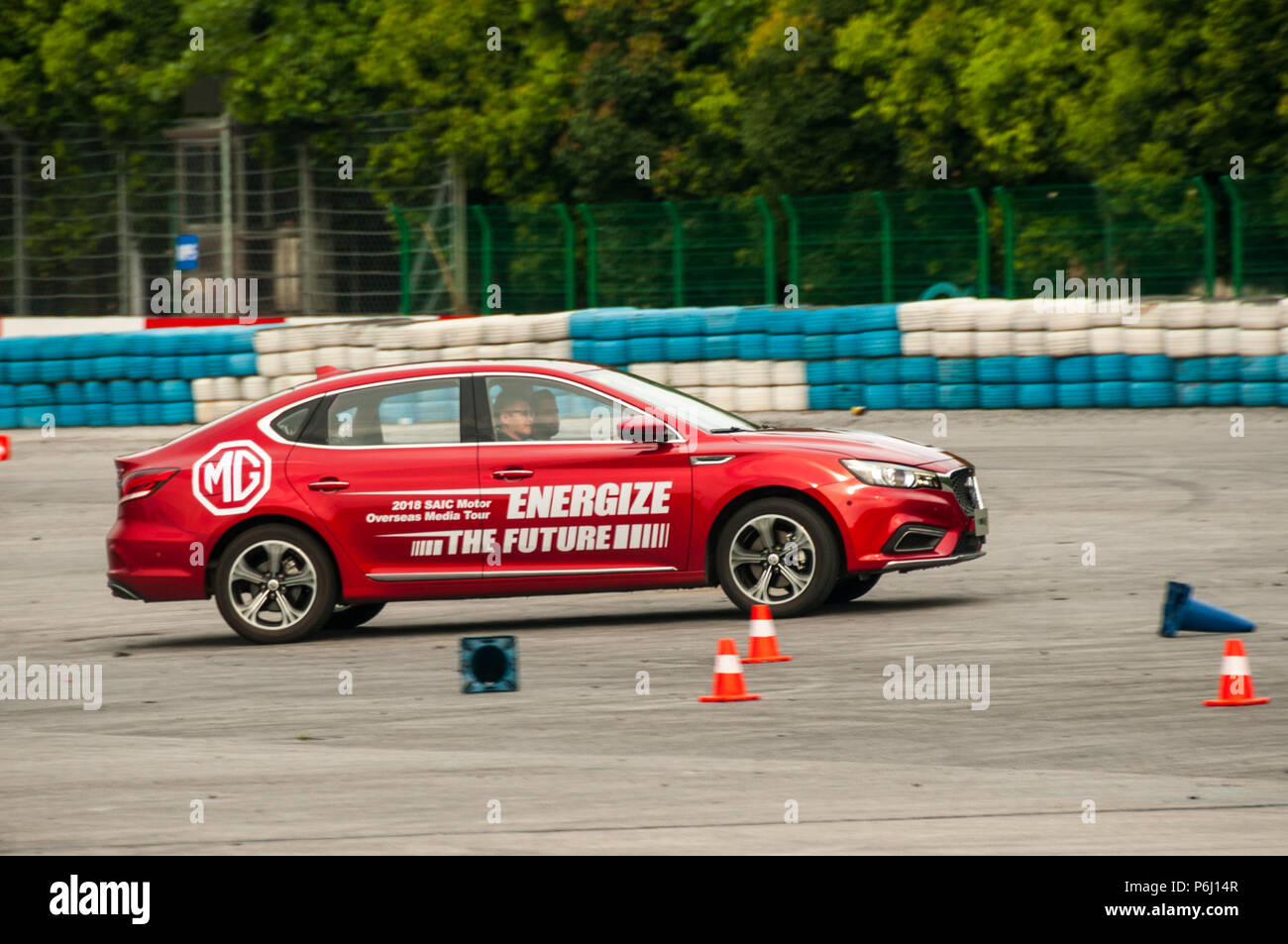 An eMG 6 from Chinese car manufacturer SAIC manoeuvring on a slalom ...