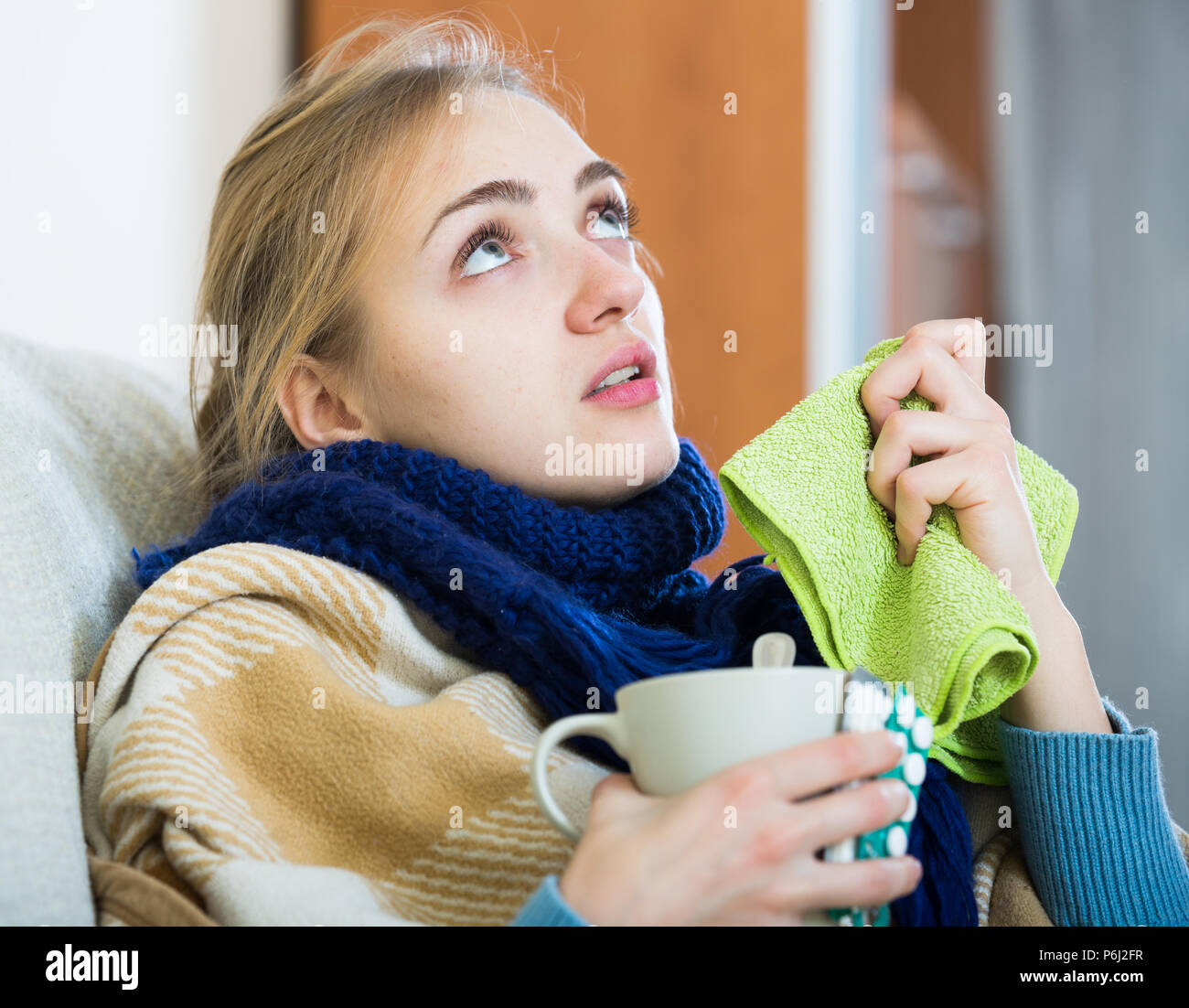Portrait of girl suffering of cold and having stuffy nose Stock Photo ...