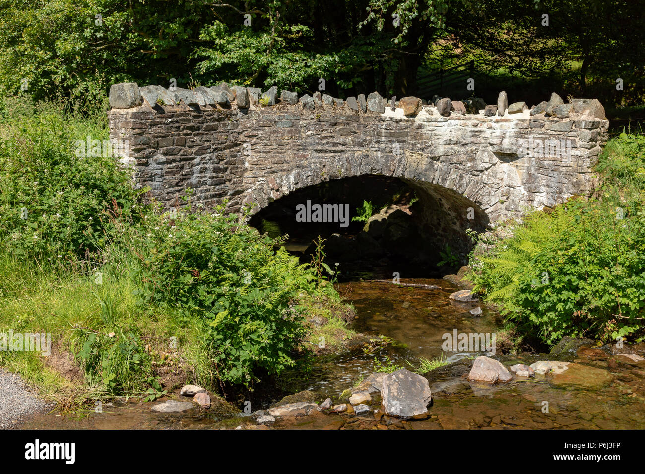 Robber's Bridge Somerset England June 27, 2018 Small stone bridge over ...