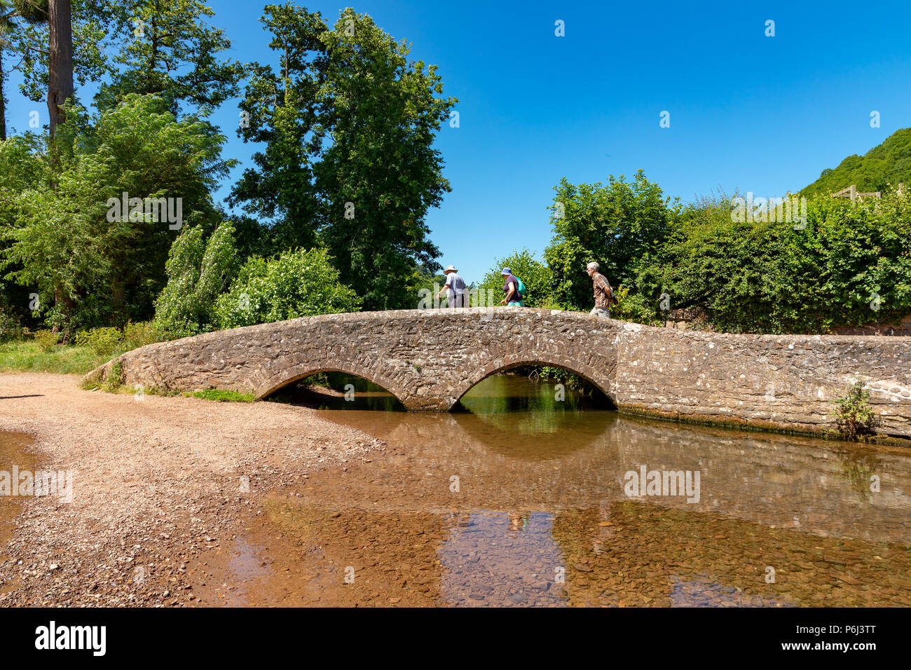 Dunster Somerset England June 27, 2018 The Gallox bridge across the ...