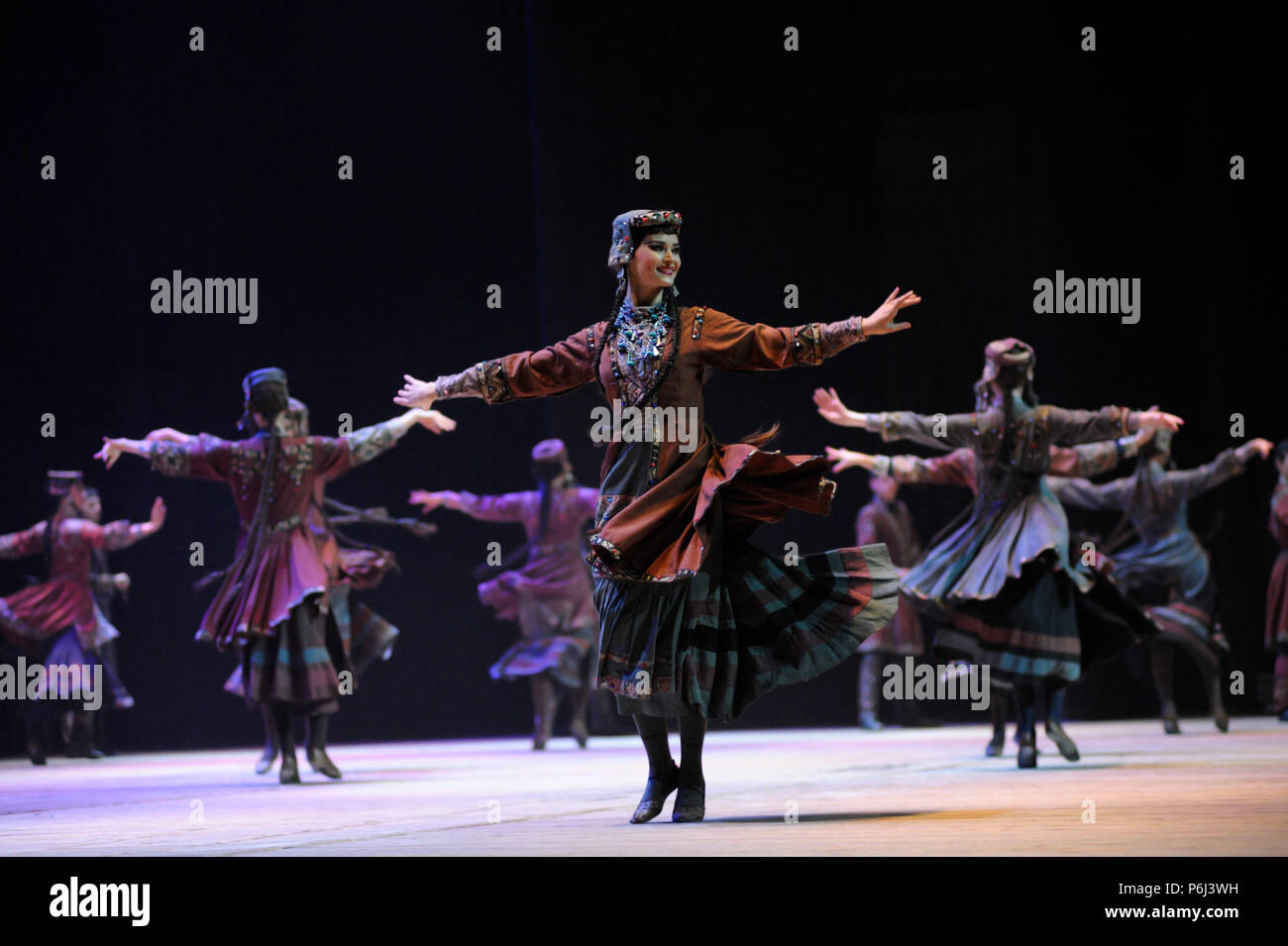Dancers performing native Georgian dance on stage. Sukhishvili, The ...