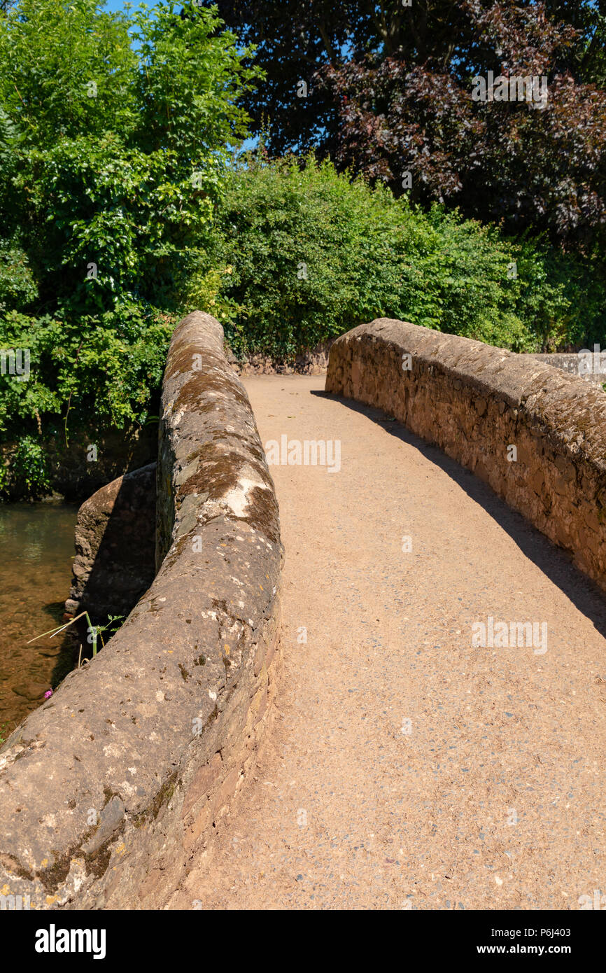 Dunster Somerset England June 27, 2018 The Gallox bridge across the ...