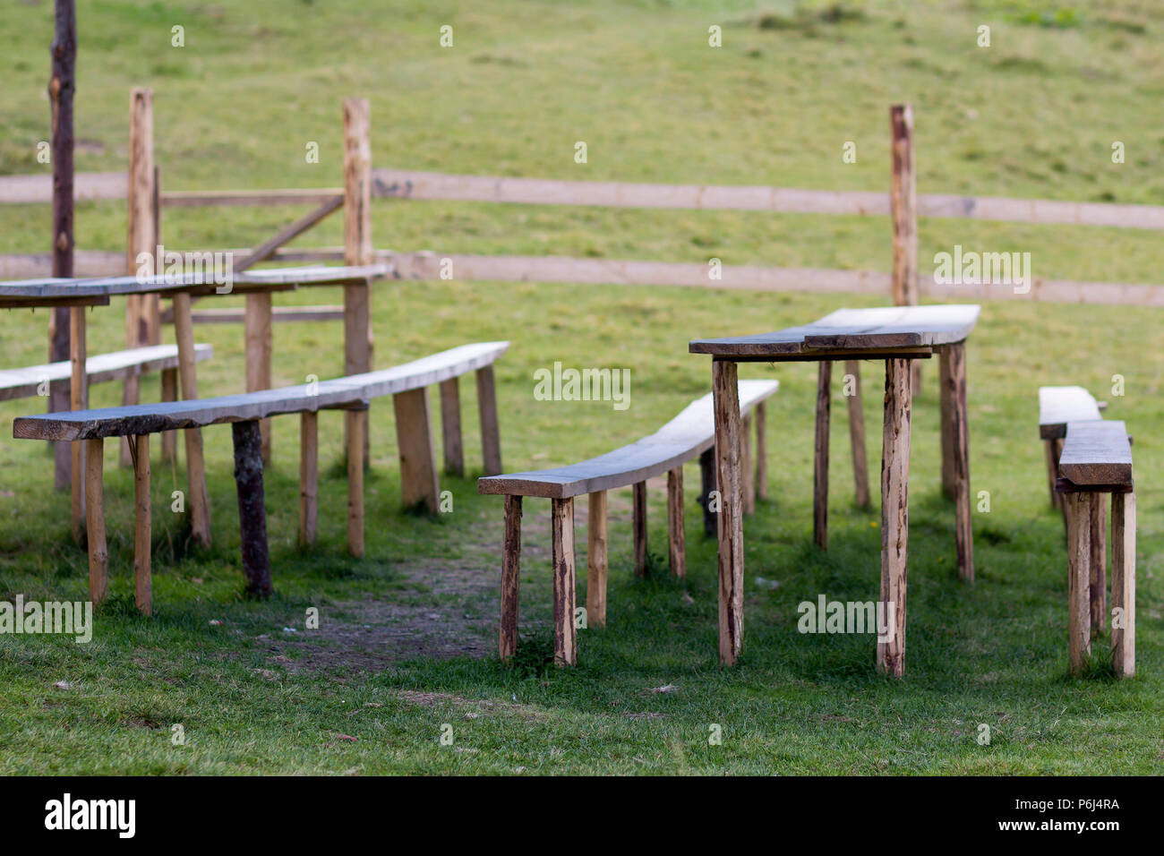Picnic place for rest on green grass. Lit by bright summer sun old ...