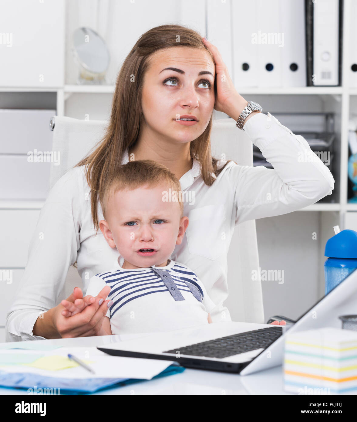 Perplexed woman 22-27 years old is having issue while working behind ...