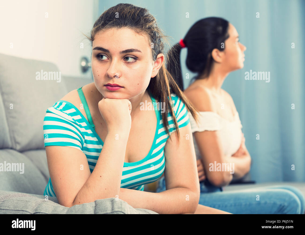 Teenagers sitting apart hi-res stock photography and images - Alamy