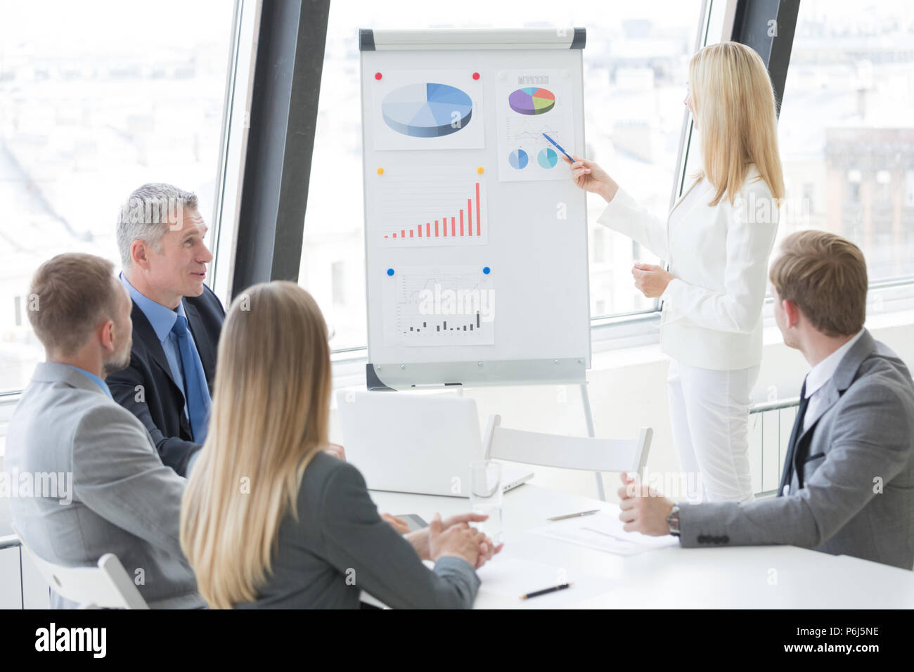 Business people team at presentation working with charts and diargams ...