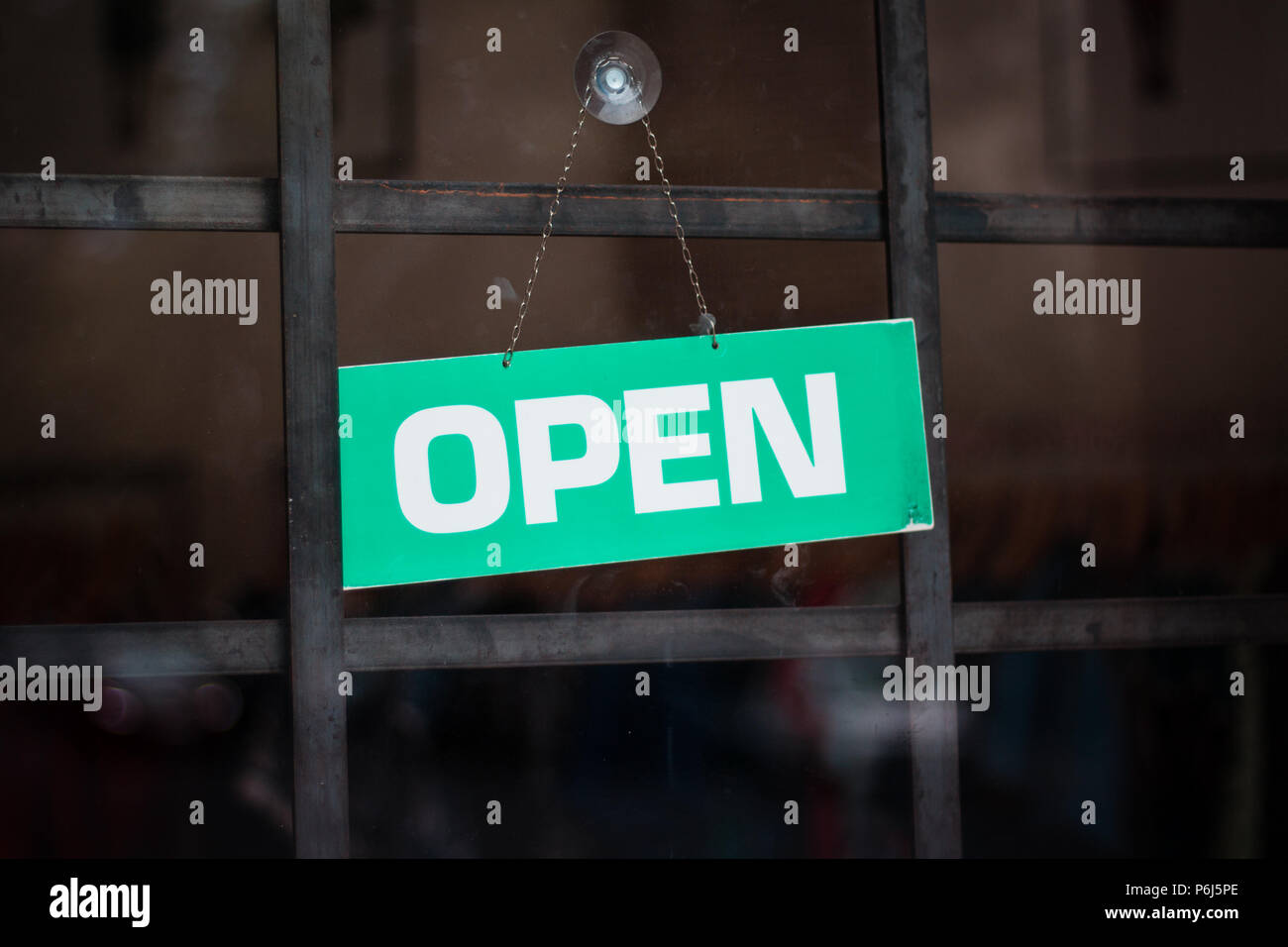 open sign on shop window - open sign on door Stock Photo - Alamy