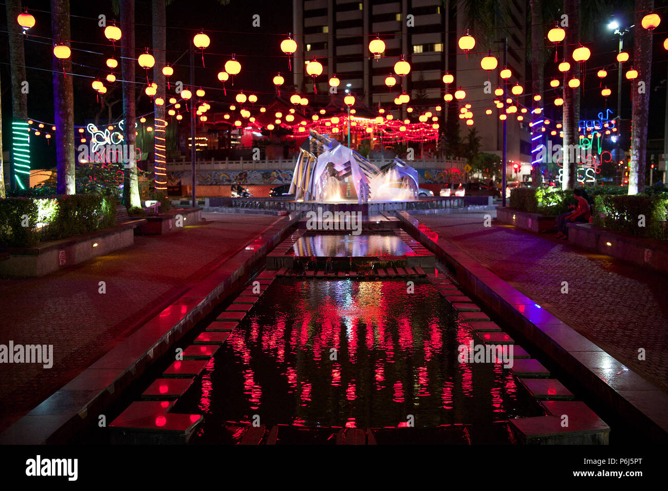 Lit fountain and pools at night Kuching Sarawak Malaysia Stock Photo ...
