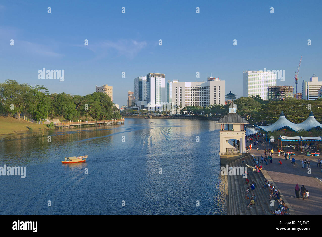Waterfront promenade with ciy skyline and Sarawak River Kuching Sarawak ...