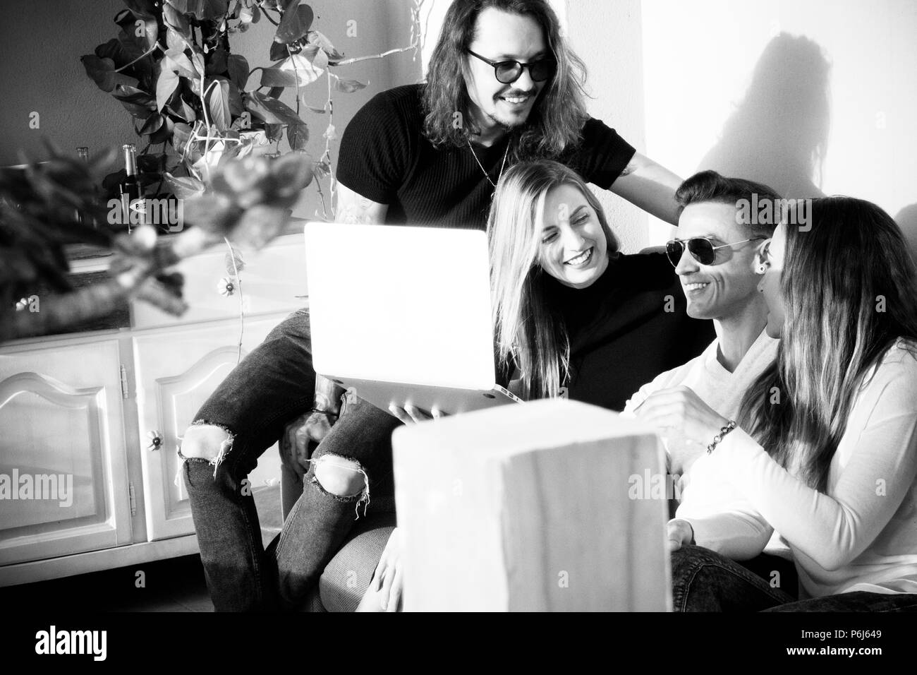 Couple work on laptop Black and White Stock Photos & Images - Alamy