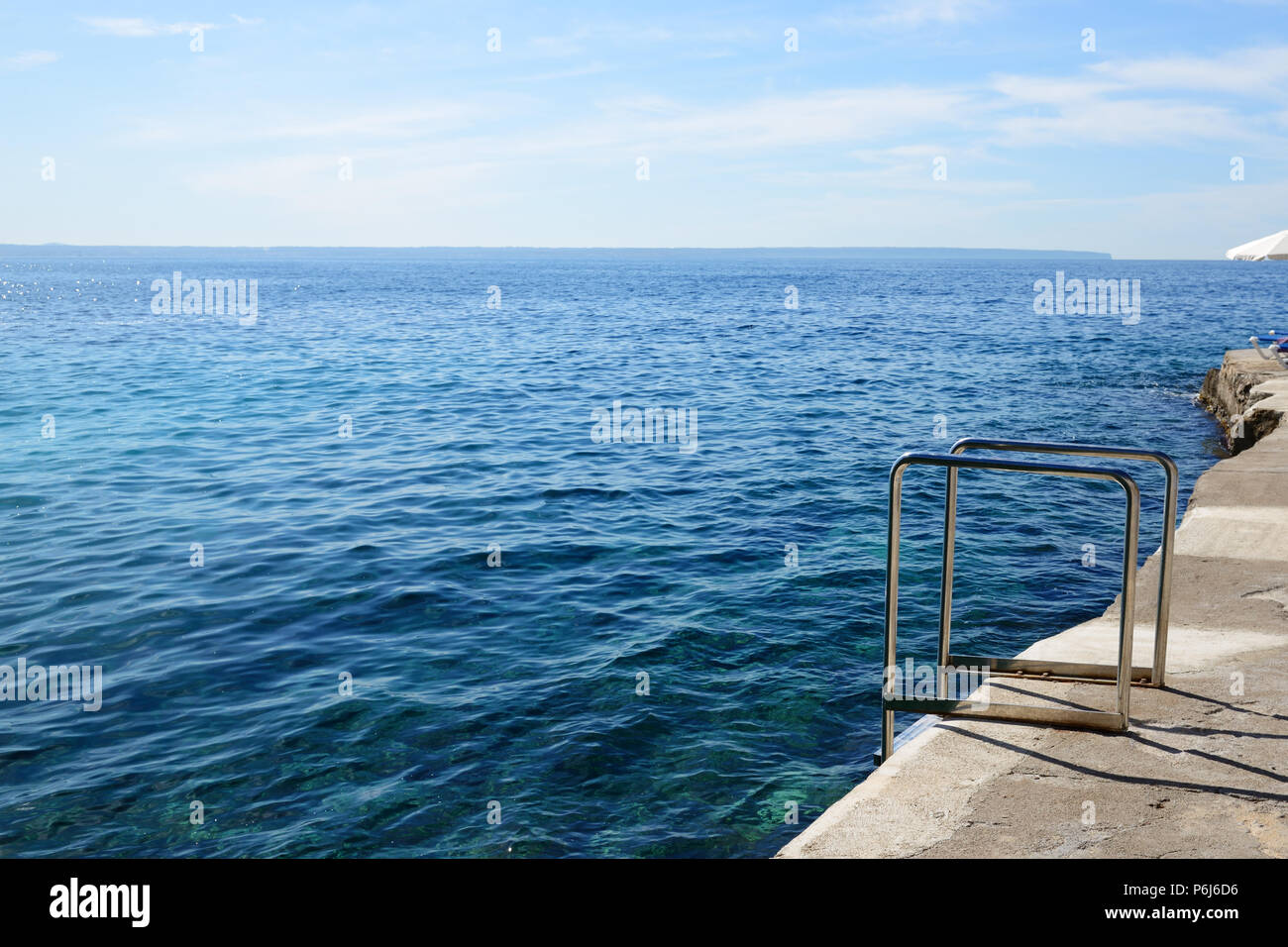 The sea view terrace and beach ladder, Mallorca, Spain Stock Photo - Alamy