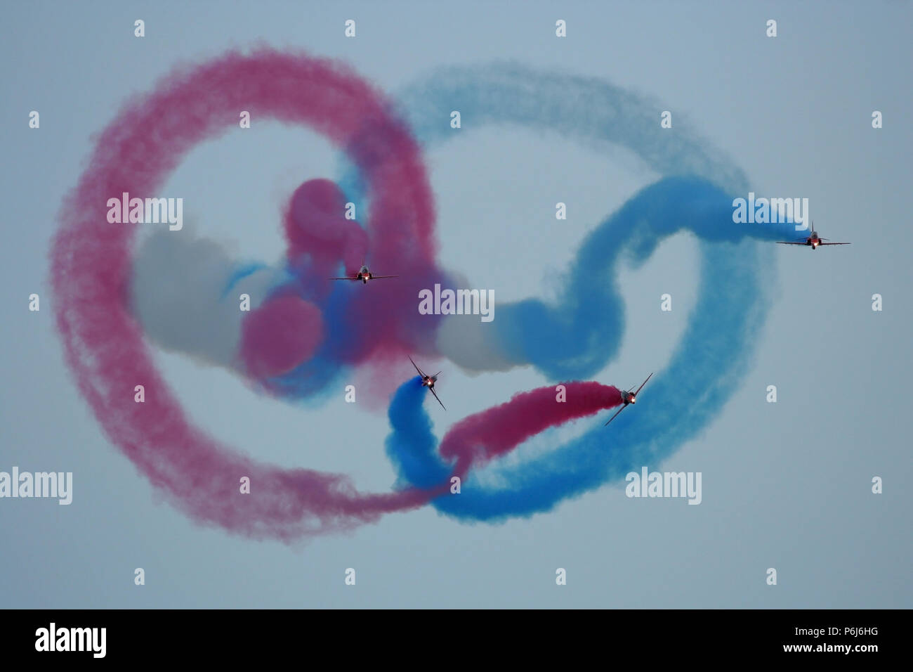 Royal Air Force display team, The Red Arrows rolling towards the crowd ...