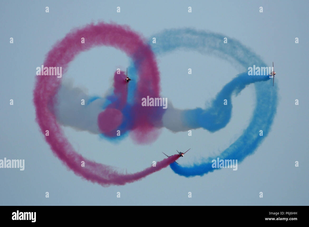 Royal Air Force display team, The Red Arrows rolling towards the crowd ...