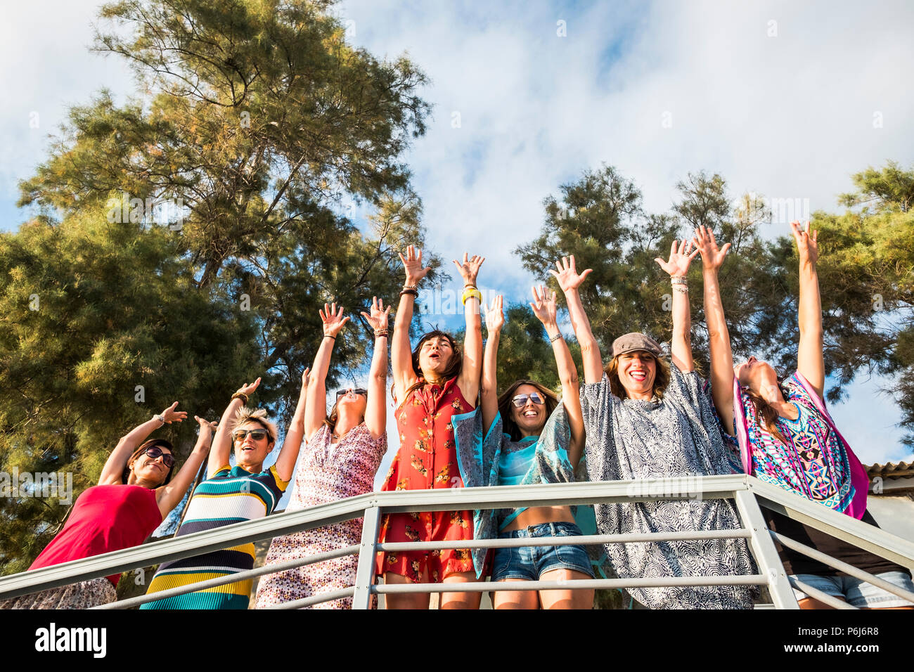 group of seven girls staying outdoor enjoying activity leisure in ...