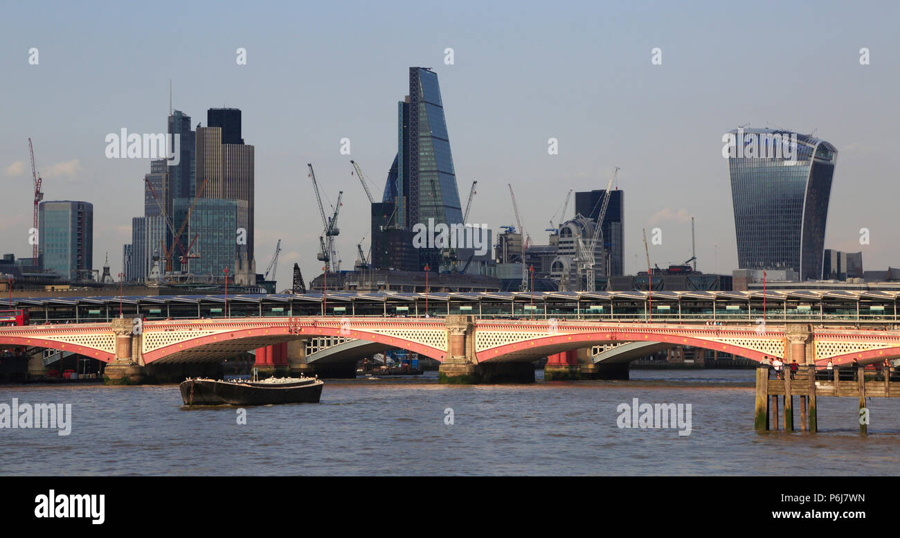 Blackfriars Bridge crossing the River Thames with the modern ...