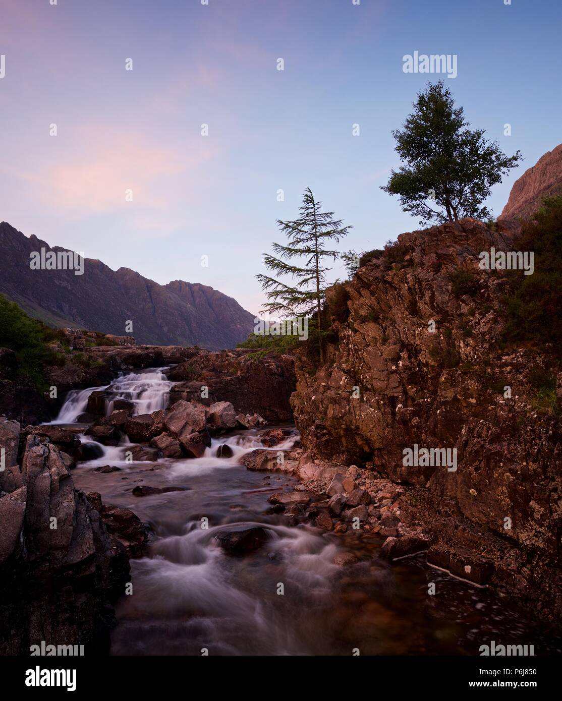 A vivid sunset in Glencoe. This was taken at the falls on the River Coe ...