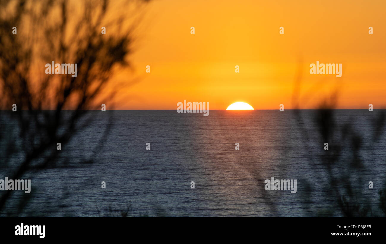 sunset reflection on sea Stock Photo - Alamy