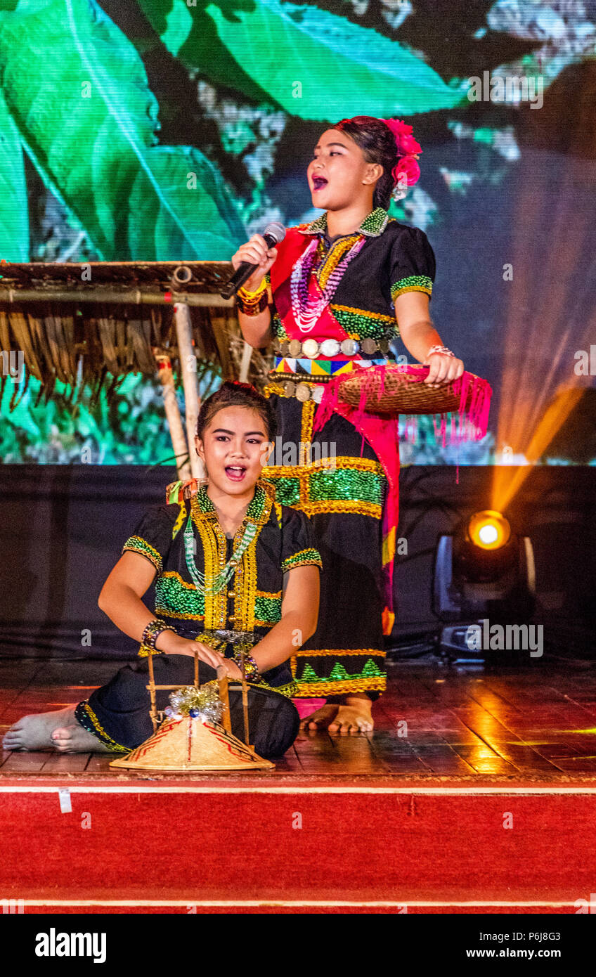 Young people in traditional costume at KDCA building in Kota Kinabalu ...
