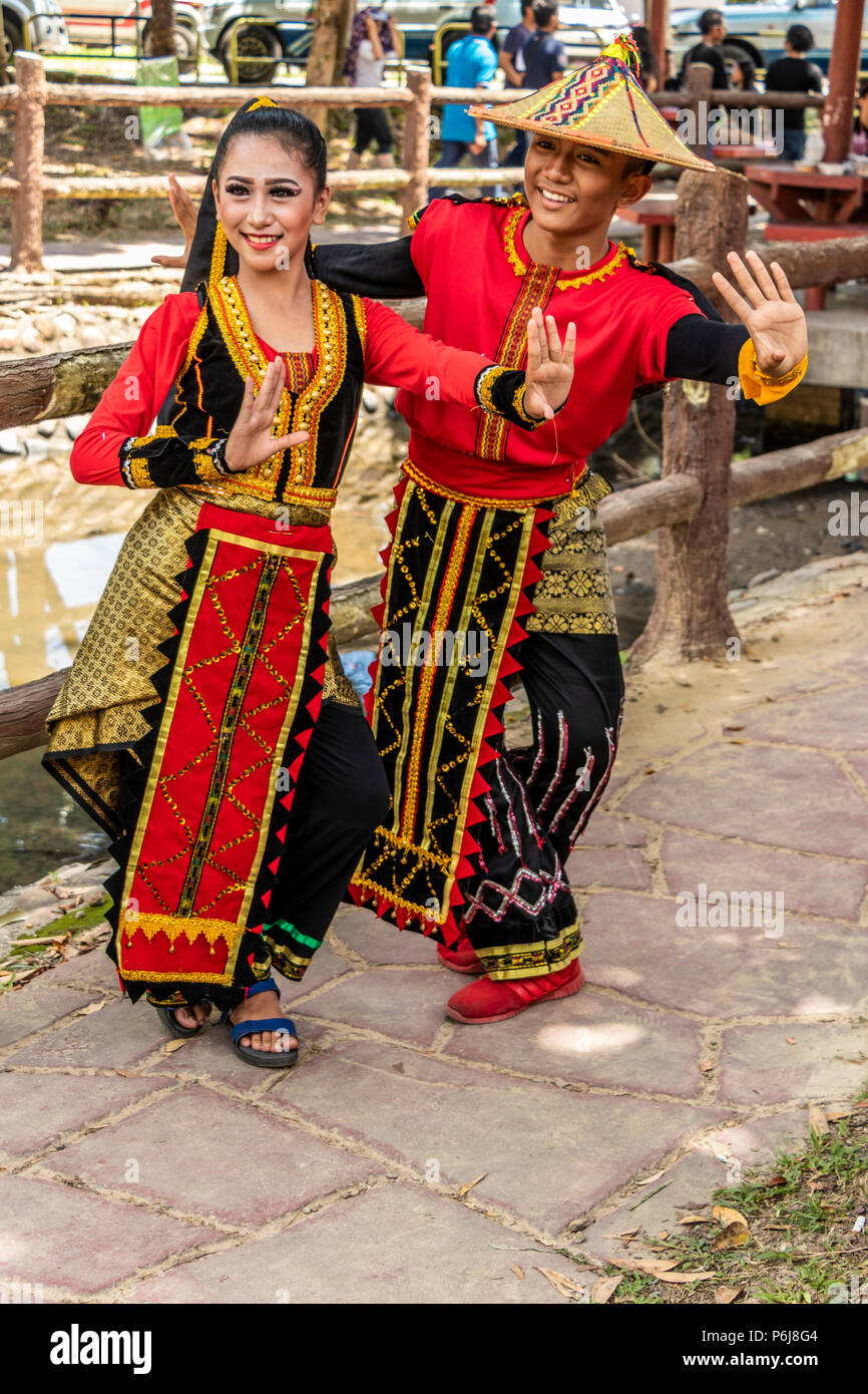 Local costume on display and couple giving dancing display on first day ...