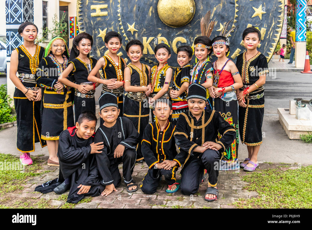 Young people in traditional costume at KDCA building in Kota Kinabalu ...