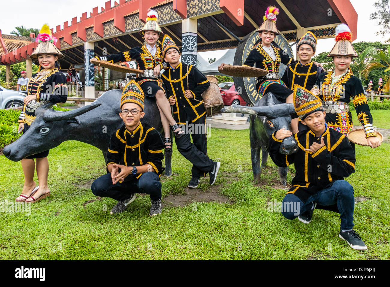 Young people in traditional costume at KDCA building in Kota Kinabalu ...