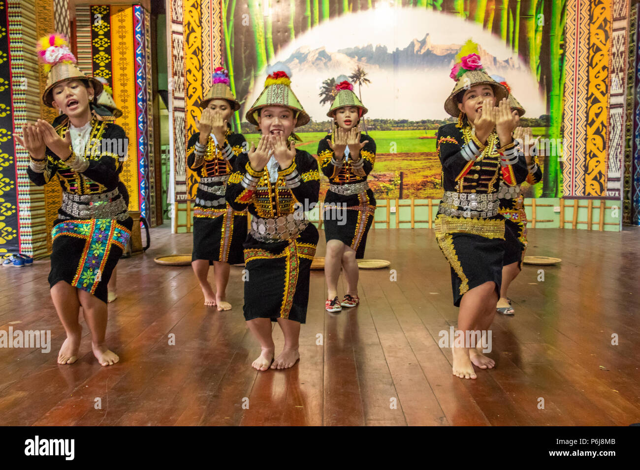 Young people in traditional costume at KDCA building in Kota Kinabalu ...