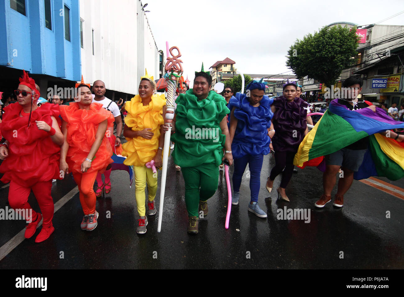 Philippines. 30th June, 2018. Pride march participants wearing colorful ...