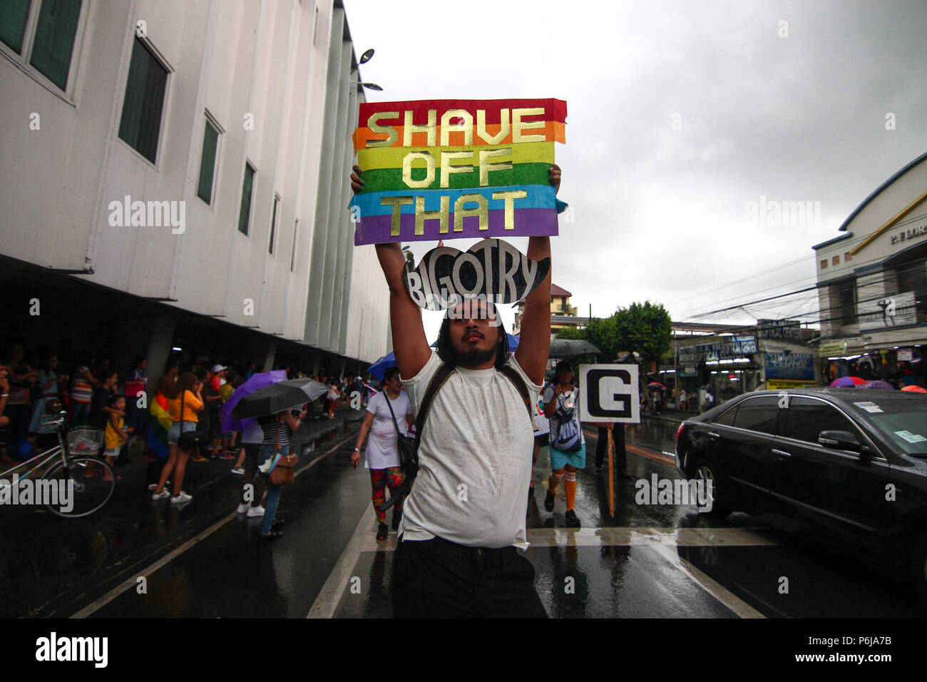 Philippines. 30th June, 2018. A participant holding a banner during the ...