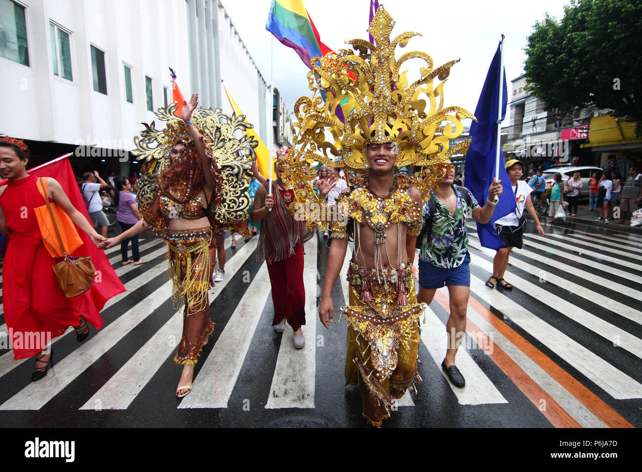 Philippines. 30th June, 2018. Pride march participants wearing colorful ...
