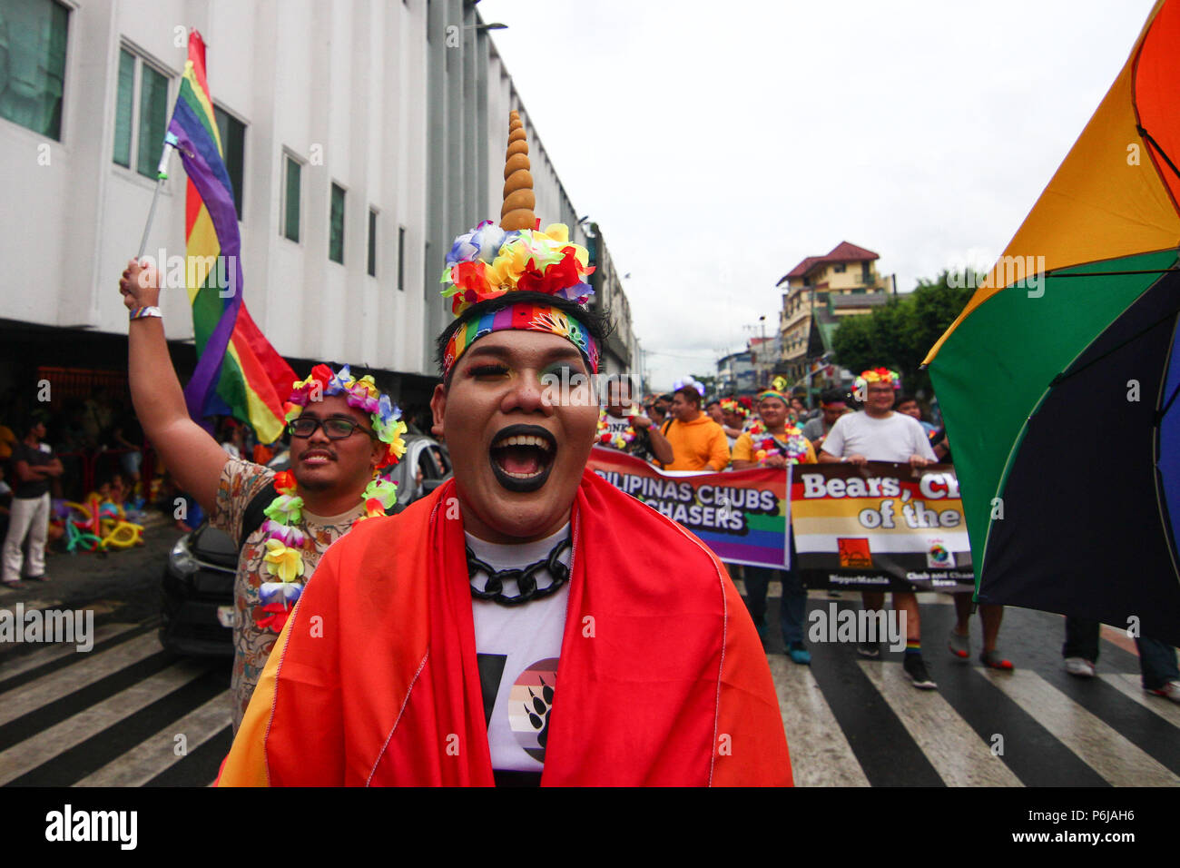 Philippines. 30th June, 2018. Pride march participants wearing colorful ...