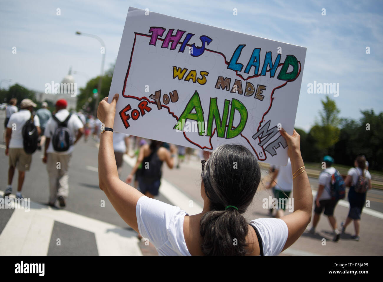 Families belong together held hi-res stock photography and images - Alamy