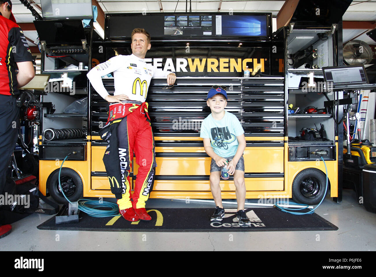 Joliet, Illinois, USA. 30th June, 2018. Jamie McMurray (1) hangs out in ...
