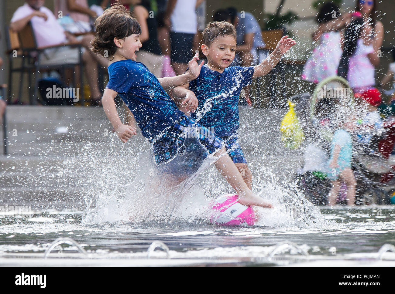 Kids Wading High Resolution Stock Photography and Images - Alamy