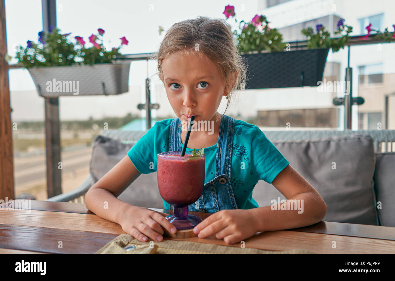child drinks a cocktail in a restaurant Stock Photo - Alamy
