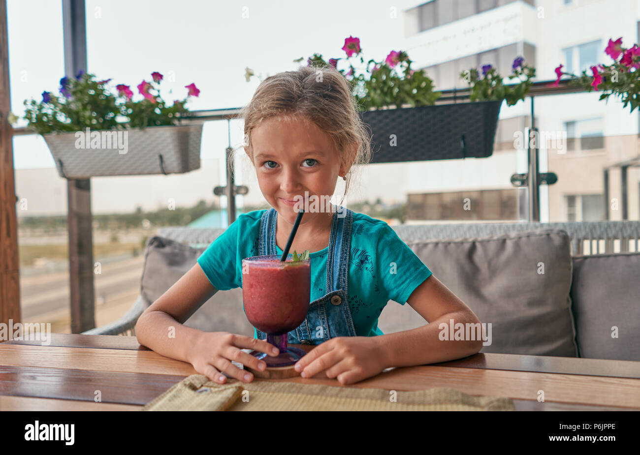 child drinks a cocktail in a restaurant Stock Photo - Alamy