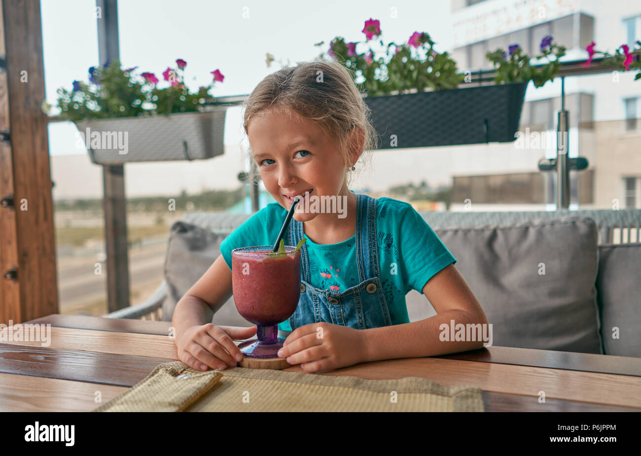 child drinks a cocktail in a restaurant Stock Photo - Alamy