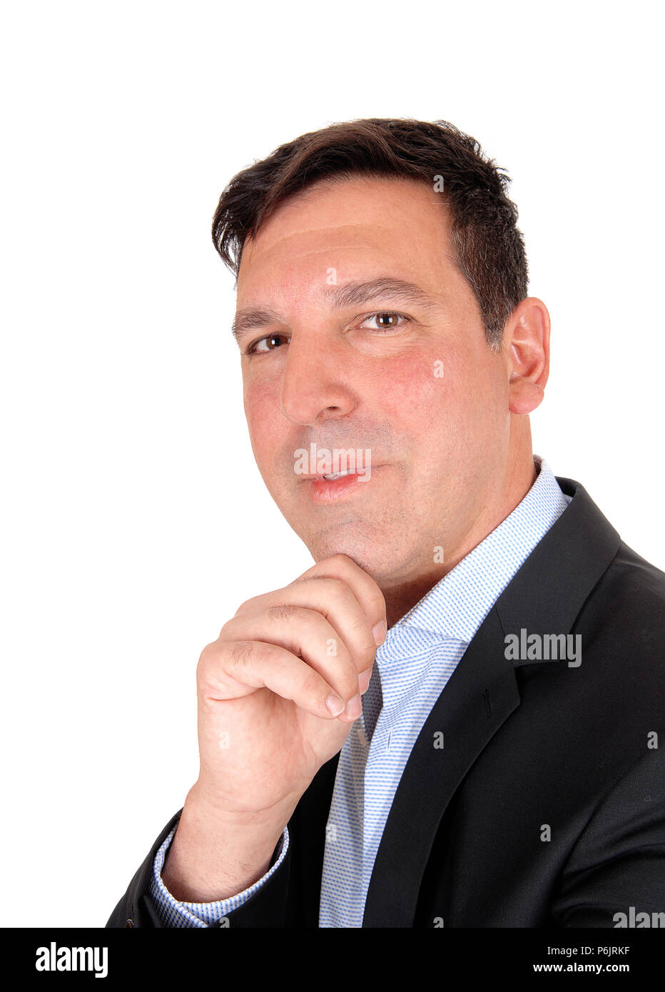 A close up image of a handsome middle age man in a suit, smiling into ...