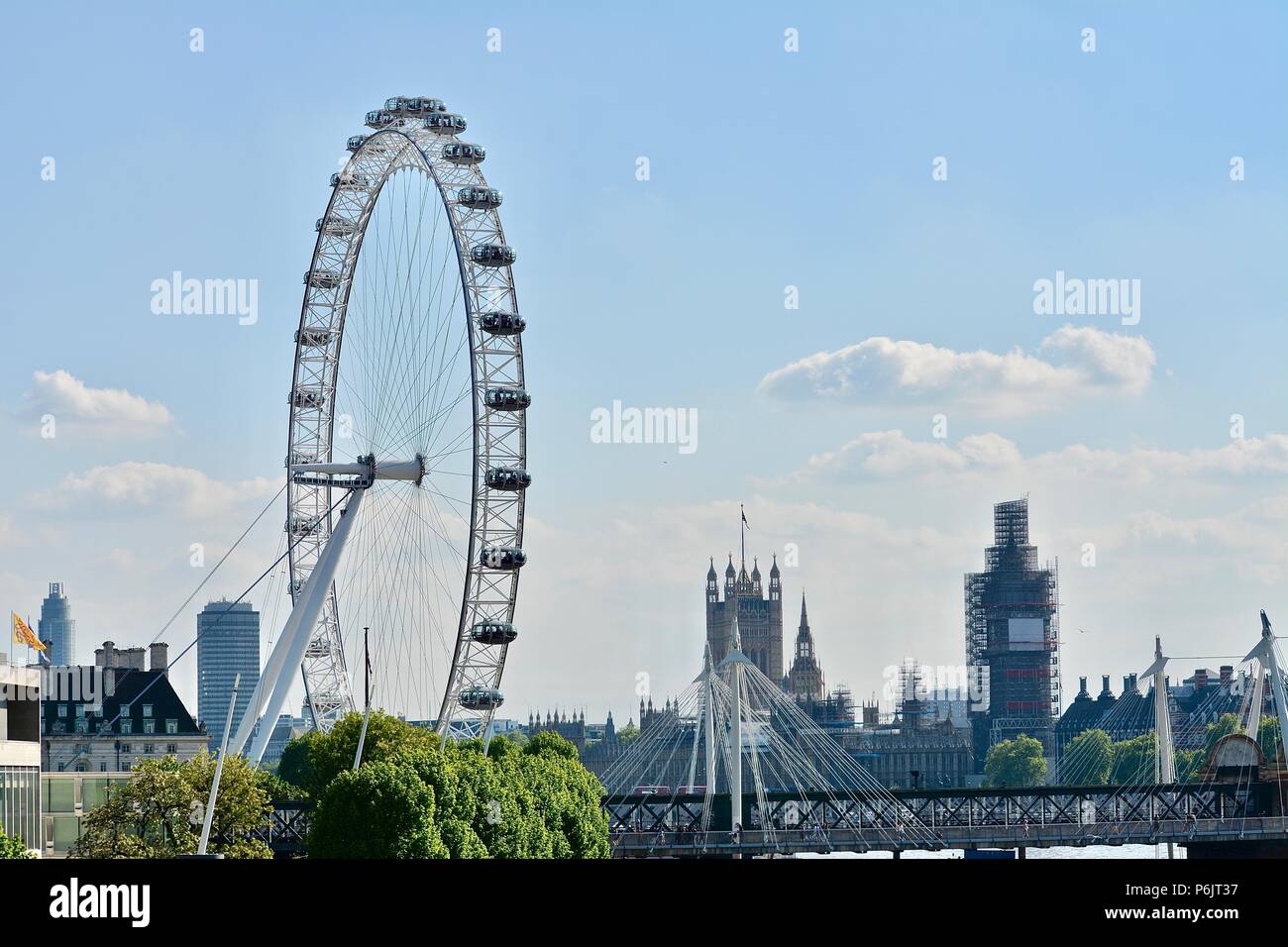 The iconic London Eye observation wheel along the River Thames, London ...