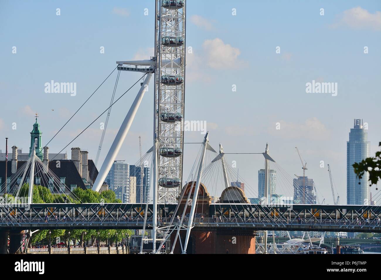 The iconic London Eye observation wheel along the River Thames, London ...
