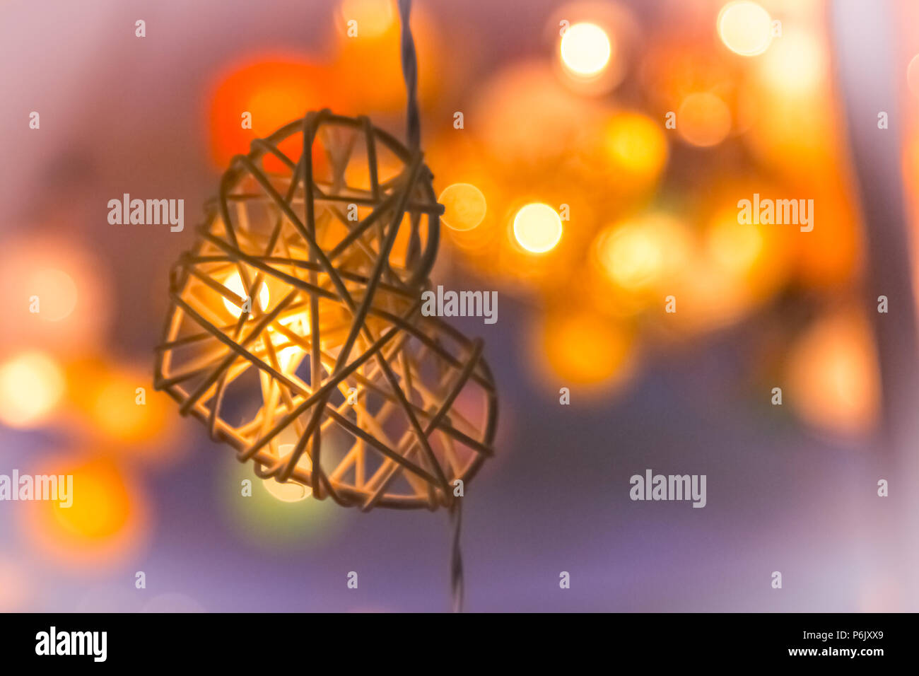 blur of Hanging heart shape Fancy light bulbs with glowing and lighting ...