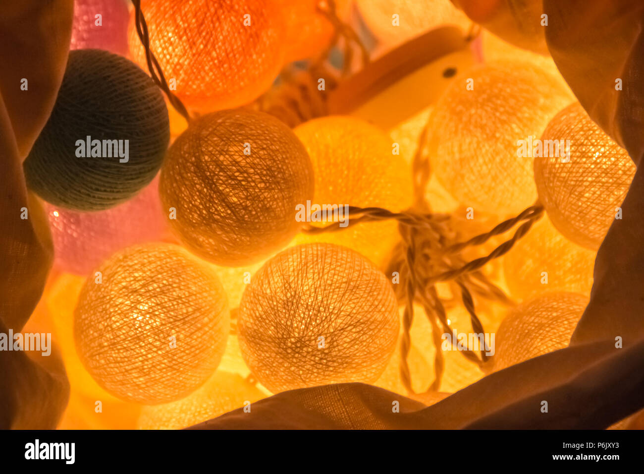 Hanging Fancy light bulbs with glowing and lighting Stock Photo - Alamy