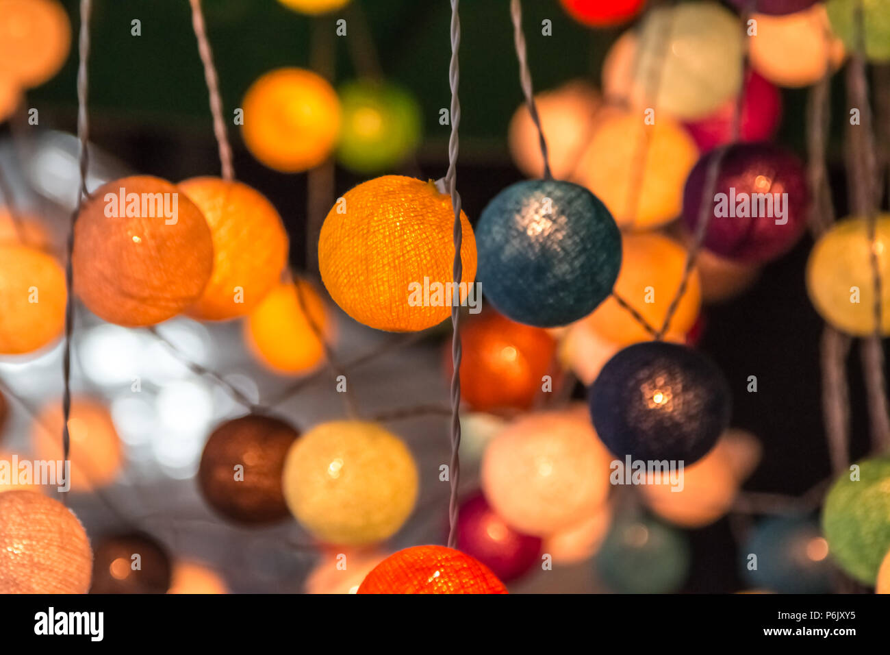 Hanging Fancy light bulbs with glowing and lighting Stock Photo - Alamy