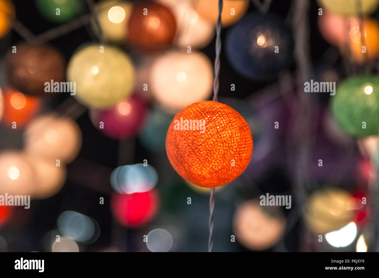 Hanging Fancy light bulbs with glowing and lighting Stock Photo - Alamy