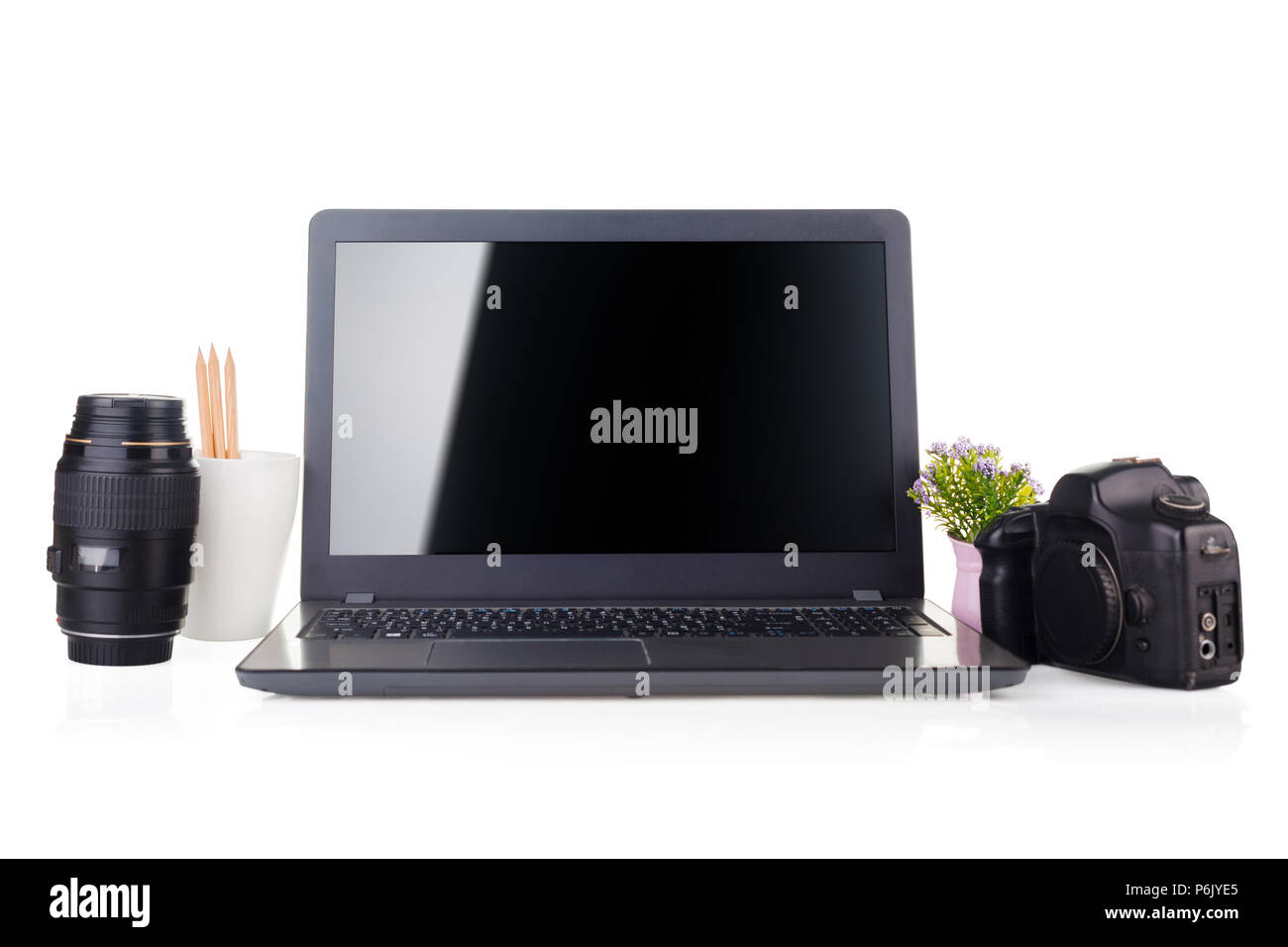 Work place with laptop and camera equipment. Objects on the isolated ...