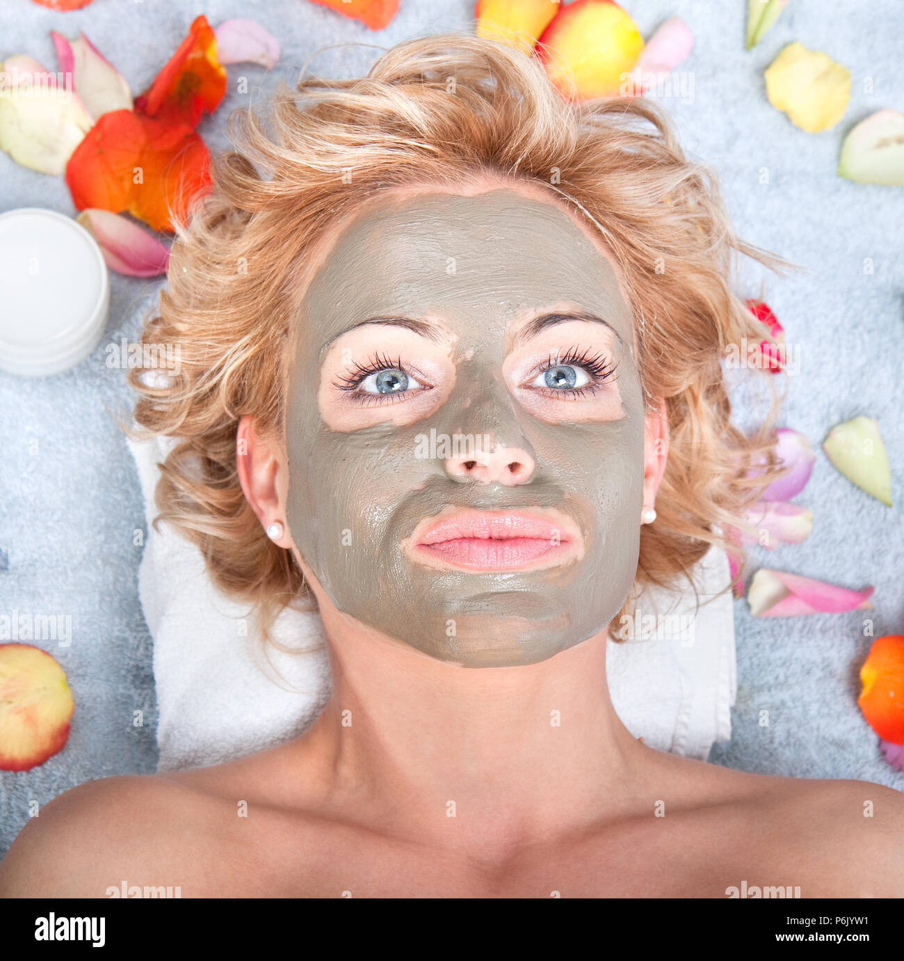 Spa treatment with dead sea mud mask Stock Photo - Alamy